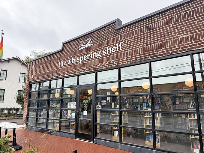 The brick fa&ccedil;ade of The Whispering Shelf beckons bibliophiles with its simple elegance and promise of literary treasures within.