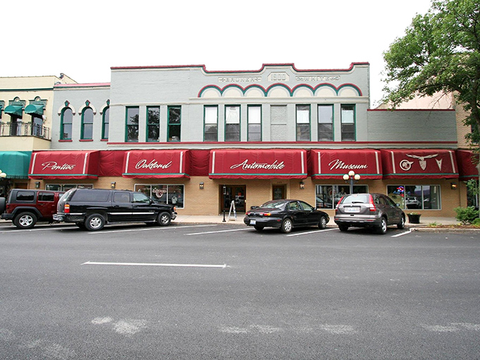 The distinctive red awning of the Pontiac Oakland Auto Museum beckons from downtown Pontiac, like a crimson carpet rolled out for automotive history buffs.