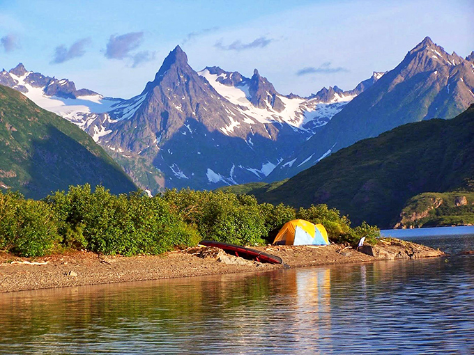 Nature's perfect campsite doesn't exi&mdash; Oh wait, there it is! Yellow tent perched between pristine waters and majestic peaks, the ultimate Alaskan alarm clock view.