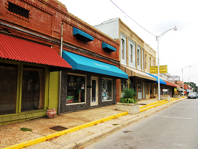 Sheridan's Main Street feels like stepping into a Norman Rockwell painting where brick storefronts and colorful awnings tell stories of simpler times.