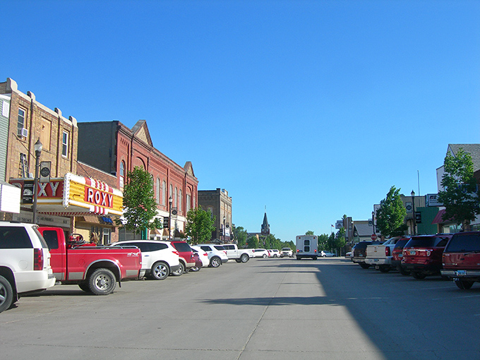 The historic Roxy Theater marquee stands proudly on Main Street, a beacon of affordable entertainment.
