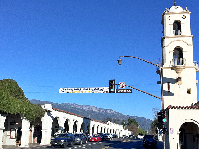 Ojai's iconic bell tower stands sentinel over the Spanish Colonial arcade, where mountain views and Mediterranean charm create California's most picturesque main street.