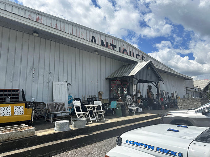 The unassuming exterior of 112 Antique Mall beckons with the promise of treasures waiting inside. Sometimes the best adventures begin with simple signage.