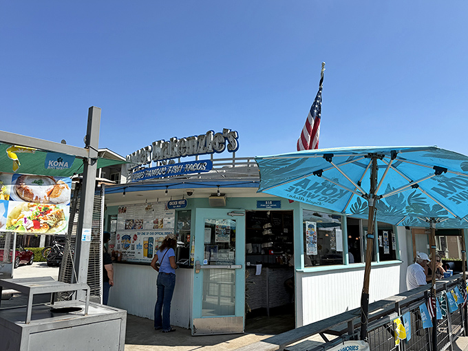 The coastal blue exterior of Spencer Makenzie's beckons like a siren song to seafood lovers. No pretension here, just the promise of ocean-fresh delights.