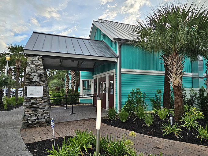 The turquoise beacon of seafood salvation stands proudly against the South Carolina sky, promising maritime delights that'll have you planning your next visit before you've even left.