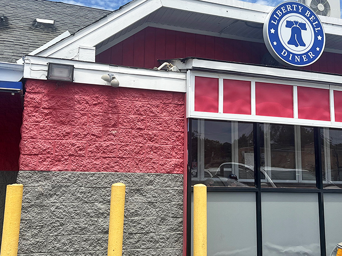 Yellow safety bollards guard the entrance like sentries protecting a national treasure &ndash; in this case, that legendary French onion soup.