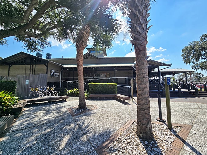 Palm trees stand sentinel at this coastal hideaway, where Lowcountry charm meets seafood paradise.