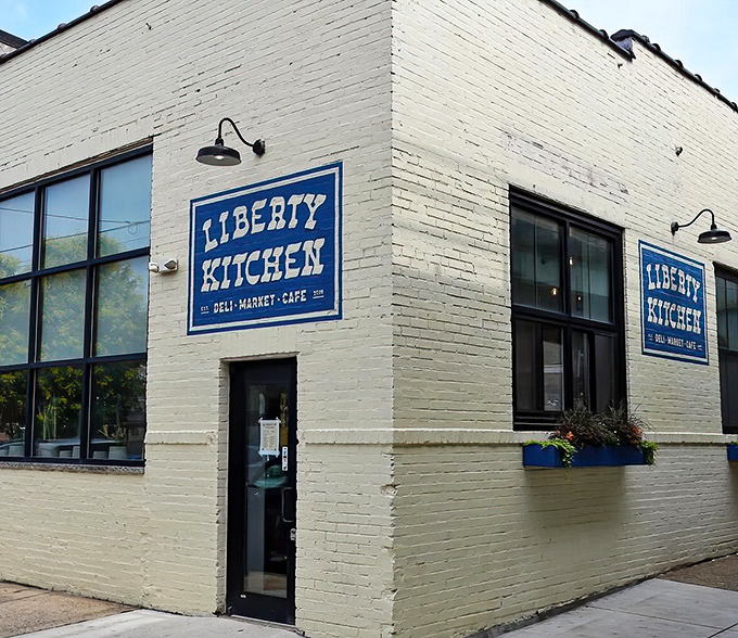 The iconic blue signage against white brick promises hoagie heaven within this unassuming corner deli.