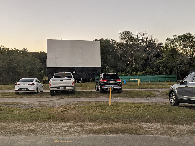 The magic hour at Joy-Lan Drive-In, where trucks and SUVs replace theater seats and the Florida sunset provides the perfect pre-show entertainment.