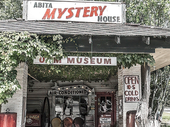 Step into wonderland! The UCM Museum's entrance promises air conditioning, cold drinks, and a journey into delightful absurdity.
