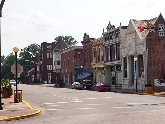 Historic storefronts line New Harmony's main thoroughfare like a perfectly preserved film set where modern life continues within 19th-century architecture.