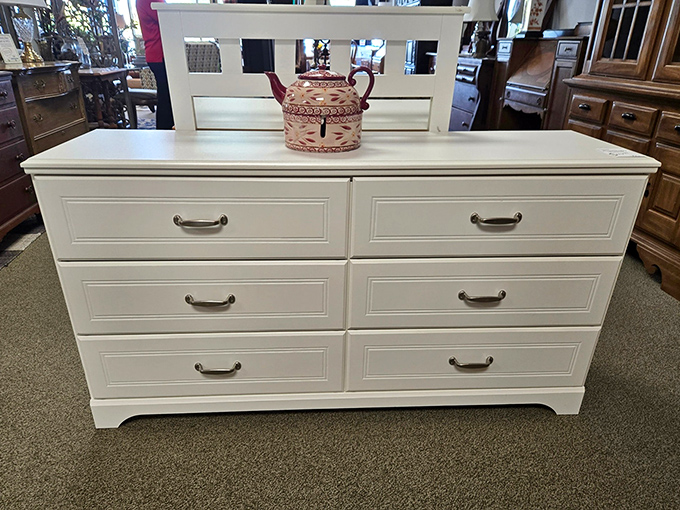 This pristine white dresser brings classic bedroom storage, proving that quality furniture doesn't always require assembly instructions or Allen wrenches.