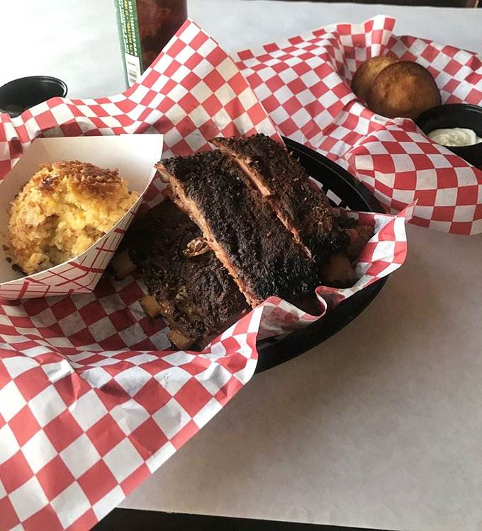 These ribs don't just fall off the bone&mdash;they practically leap into your mouth. The cornbread stands by, ready to soak up any wayward sauce.