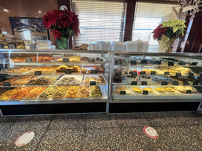 A dessert case that turns "I'll just have coffee" into "We'll need another table for these pastries."