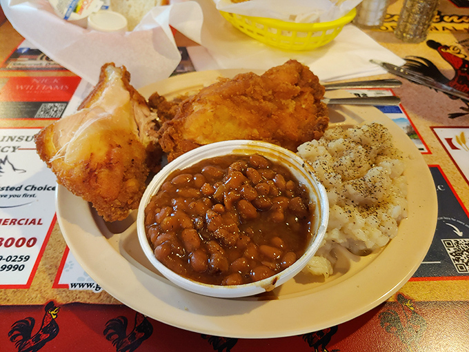 Those baked beans have clearly been simmering with purpose, creating the ideal sweet-savory sidekick to crispy fried chicken.