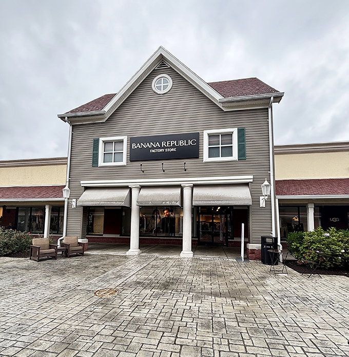 Banana Republic's colonial-style storefront houses modern fashion at yesterday's prices. Architectural charm with contemporary bargains inside.