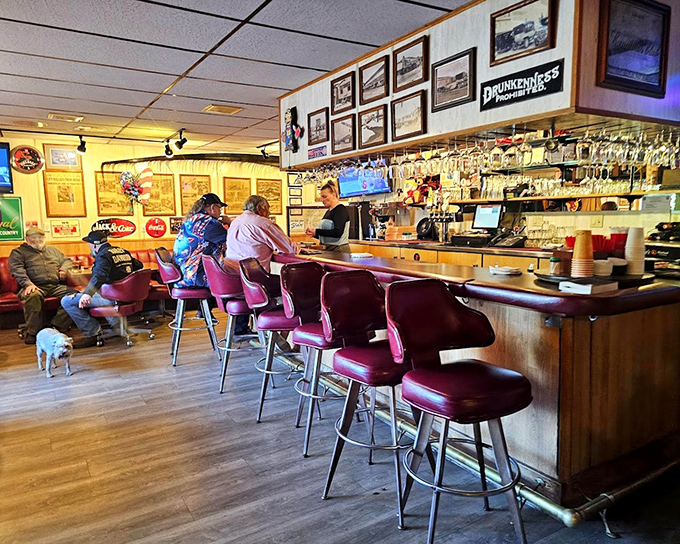 The bar area: where locals swap fishing tales and visitors pretend they understand what "breakup season" really means in Alaska.