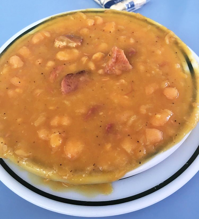Bean soup that could make a vegetarian question their life choices. Those chunks of ham aren't just ingredients&mdash;they're game changers.