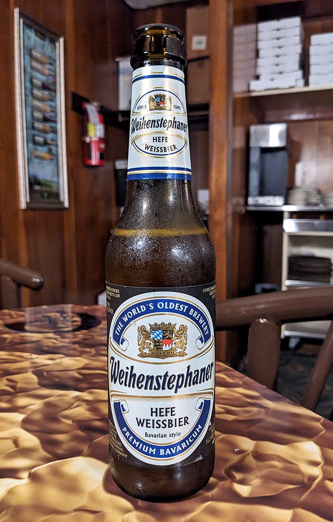 A Weihenstephaner Hefeweissbier keeping cool on that distinctive gold-patterned tabletop. Sometimes the perfect beer pairing makes good food great.