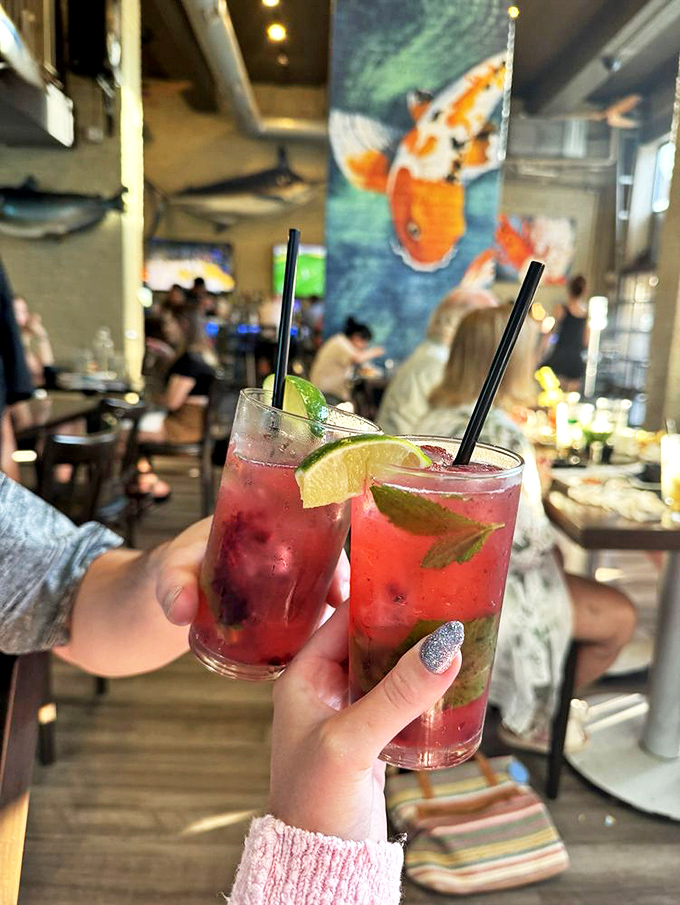 Berry mojitos: where fruit and rum come together like old friends catching up after too long apart. The perfect Strip District refreshment.