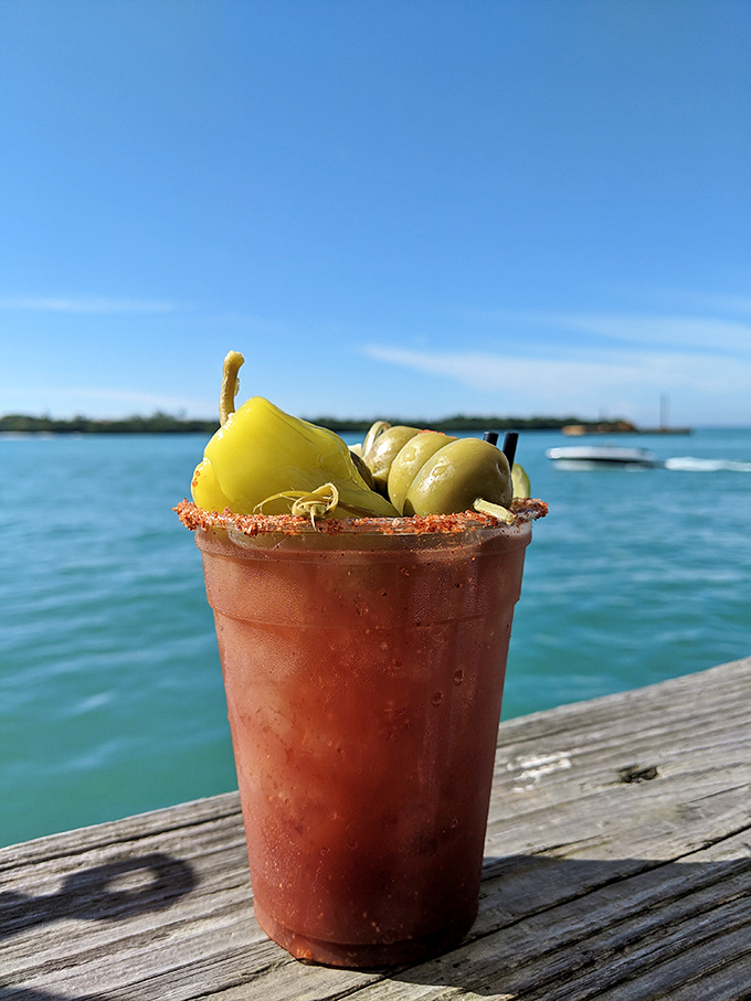 A Bloody Mary with attitude&mdash;garnished with olives and served with a side of sparkling blue water views.