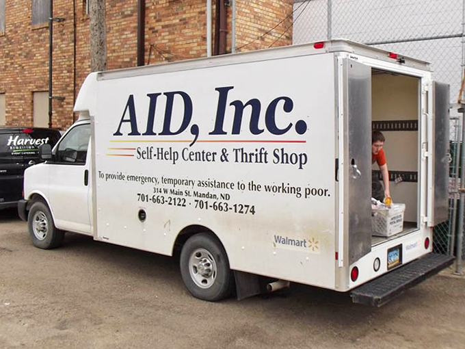 The AID, Inc. truck bringing hope and help to the community, one delivery at a time.