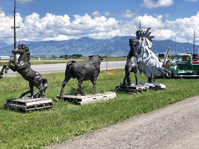 Metal menagerie! These impressive animal sculptures stand like sentinels, greeting visitors with artistic interpretations of Montana wildlife.