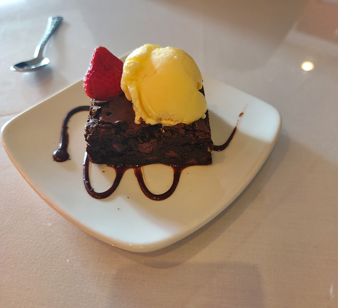 Chocolate brownie topped with gelato and fresh strawberry makes saying "I'm too full" suddenly seem negotiable.