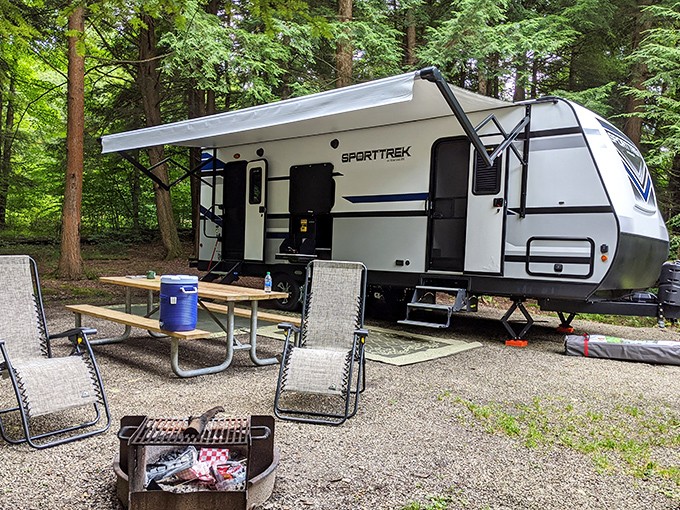 Camping nirvana with all the comforts of home. This setup proves you can commune with nature while still having somewhere to charge your phone.