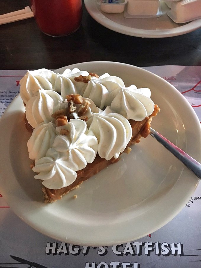 This isn't just caramel pie&mdash;it's a sweet revelation topped with clouds of whipped cream and a sprinkle of pecans for good measure.