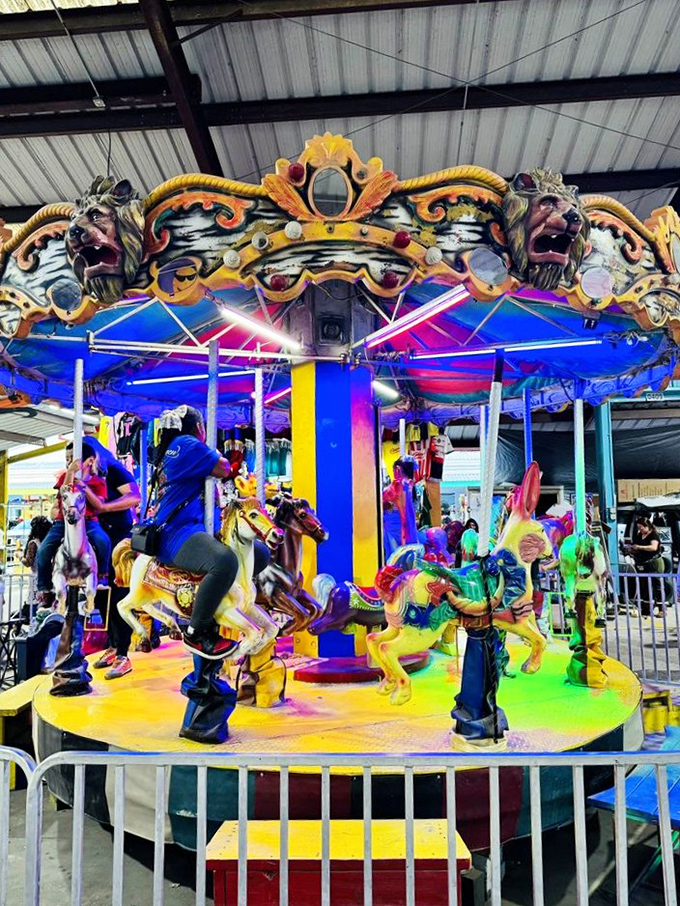 Vintage carousel horses prance in perpetual circles of joy. This technicolor merry-go-round offers a moment of whimsy between serious bargain hunting missions. 