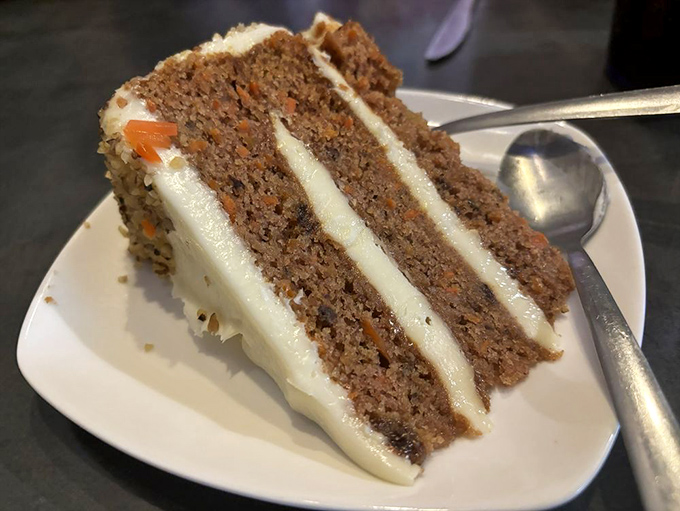 That towering slice of carrot cake with cream cheese frosting makes pretending it's health food almost believable, almost.