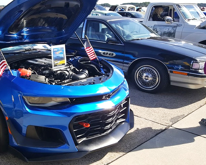 Car shows often accompany special events at the museum. Detroit muscle meets airborne might in this celebration of American engineering.