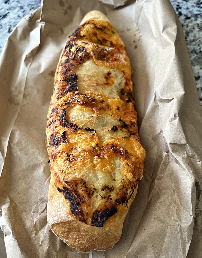 That cheese-topped baguette isn't just lunch—it's edible architecture that deserves its own tiny Louvre.