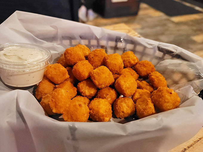 Golden cheese curds that squeak with Wisconsin pride &ndash; each bite delivers that perfect balance of crispy exterior and gooey, melty interior that makes resistance futile.