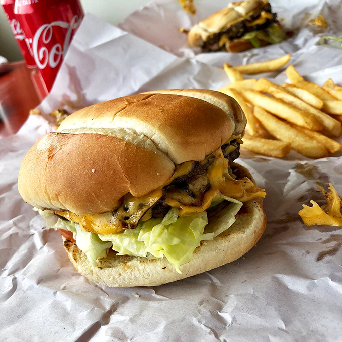 The cheeseburger comes dressed for success&mdash;melty American cheese cascading over a hand-formed patty with fresh lettuce for that essential crunch.