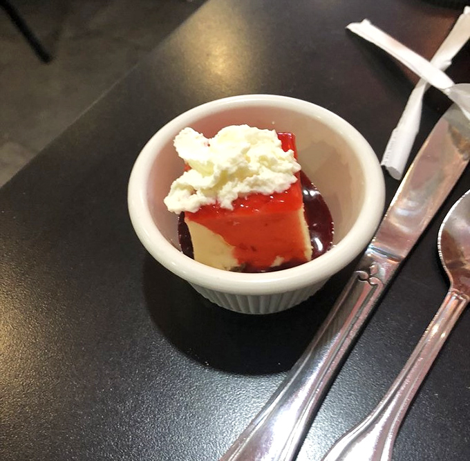 A cheesecake that doesn't need size to make an impression—small but mighty, like Danny DeVito or a perfectly crafted haiku.