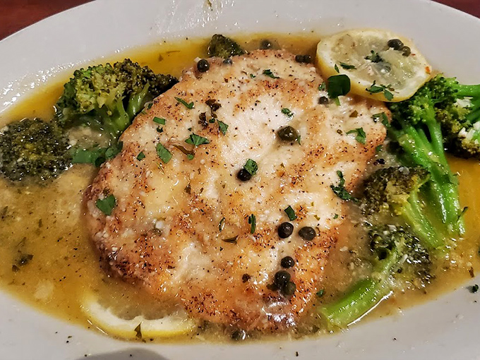 Chicken piccata with capers and lemon, surrounded by perfectly roasted broccoli. A dish that says, "Yes, I'm an adult who enjoys vegetables."