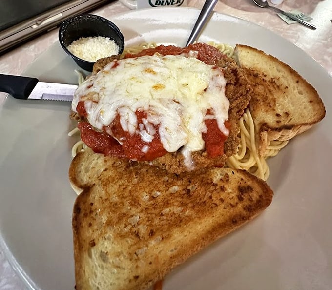 Chicken Parmesan that would make any Italian grandmother nod in approval. Melty cheese, tangy sauce, and enough garlic bread for proper plate-mopping.