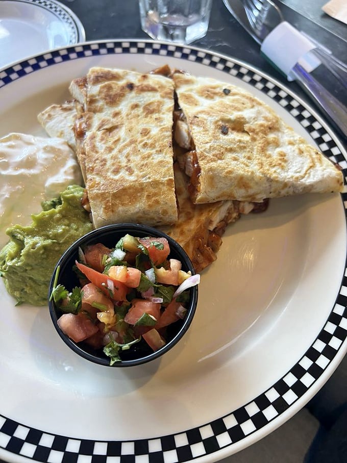 Grilled chicken quesadilla with fresh pico de gallo—proof that fusion done properly is absolutely delicious.