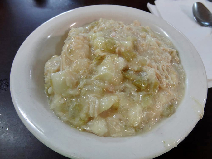 Chicken and dumplings swimming in gravy &ndash; this is what clouds would taste like if heaven had a cafeteria.