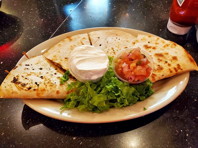 Quesadillas crisp enough to make a satisfying crunch heard 'round the diner. That salsa and sour cream are just waiting for their moment.