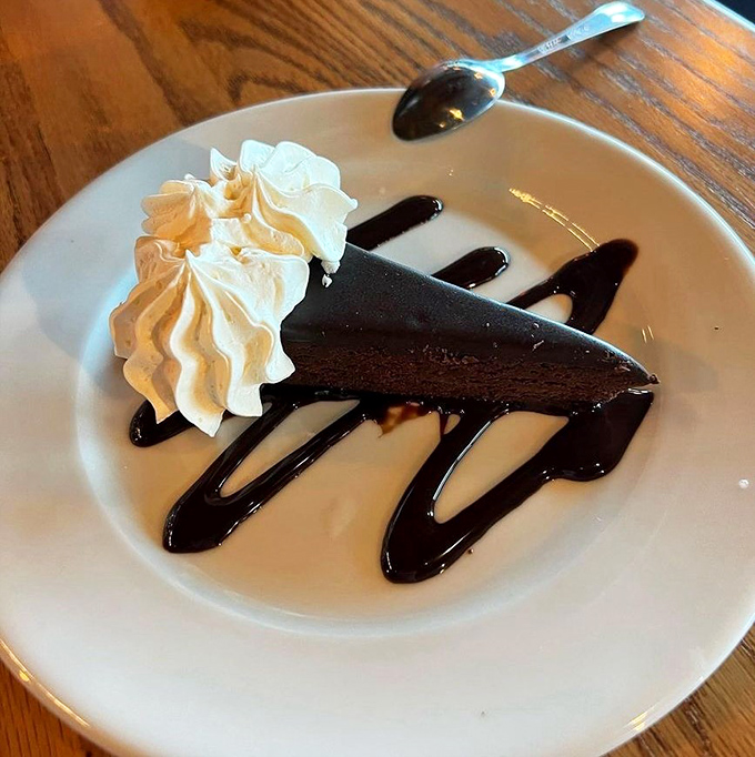 Chocolate cake that doesn't just satisfy your sweet tooth&mdash;it throws a party for it. That whipped cream isn't garnish&mdash;it's the perfect dance partner.