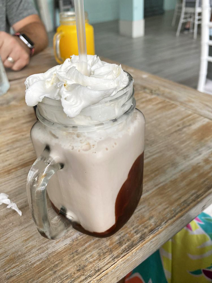 This isn't just chocolate milk—it's a childhood memory in a mason jar, all grown up with whipped cream and a side of nostalgia.