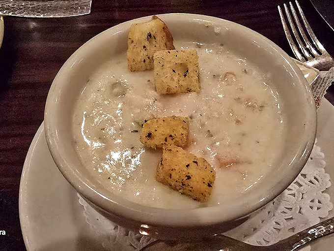 Clam chowder so creamy it should be illegal in seven states. Those golden croutons floating like treasure chests in a sea of comfort.