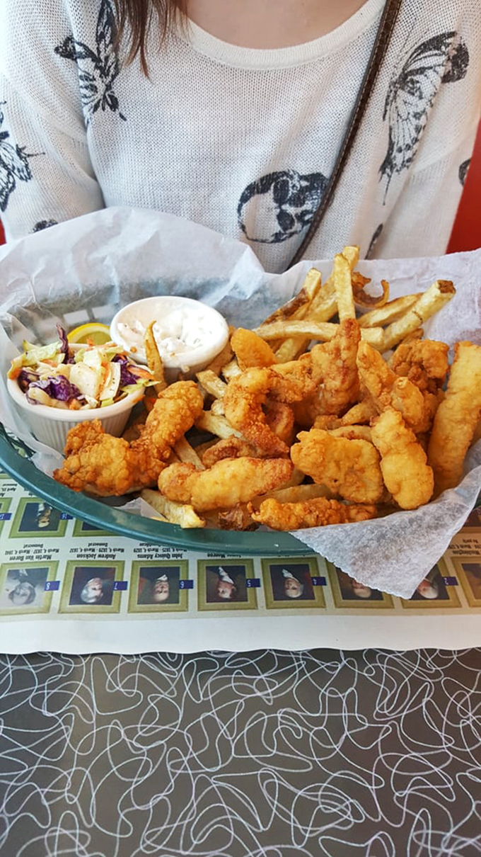 Golden-fried clam strips that crunch with each bite, served with crispy fries and creamy coleslaw &ndash; the coastal Connecticut trifecta.