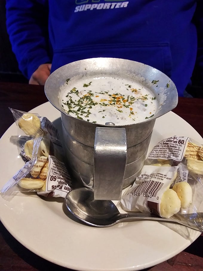 Clam chowder served in a metal bucket&mdash;because sometimes greatness requires unconventional presentation.