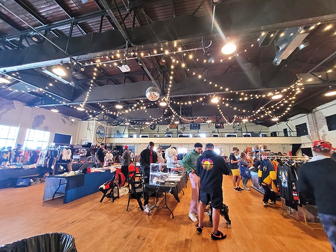 The disco ball overhead turns this vintage market into an impromptu fashion show where vintage finds and modern designs share the spotlight.