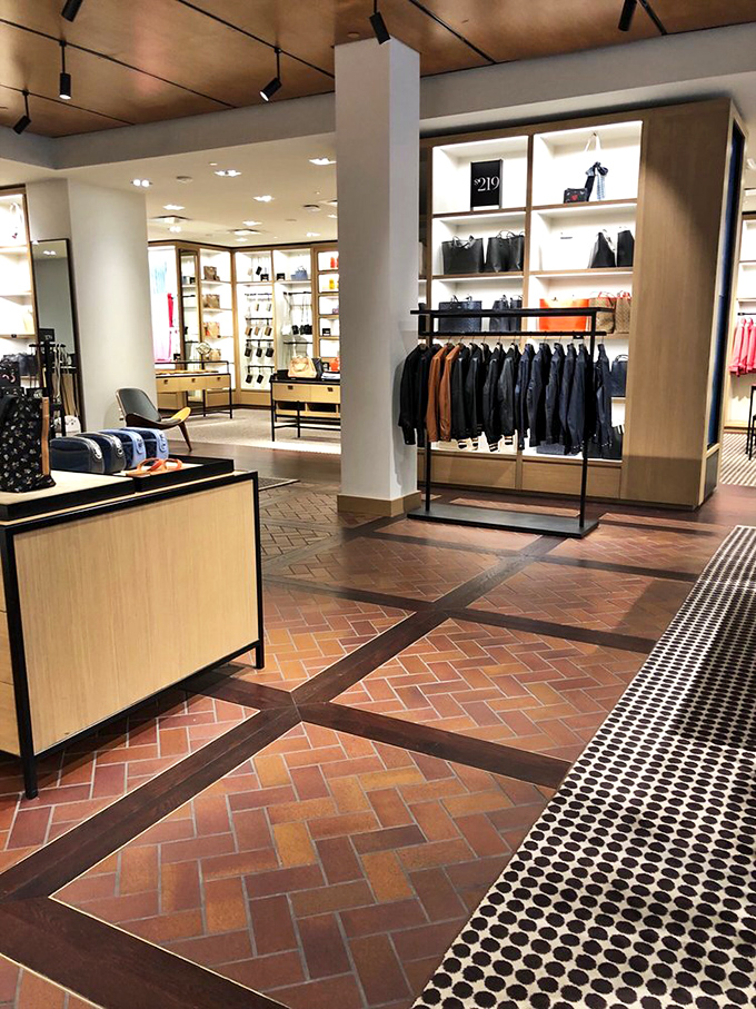 Sophisticated lighting and thoughtful displays transform shopping from errand to experience. This isn't just retail&mdash;it's retail therapy.