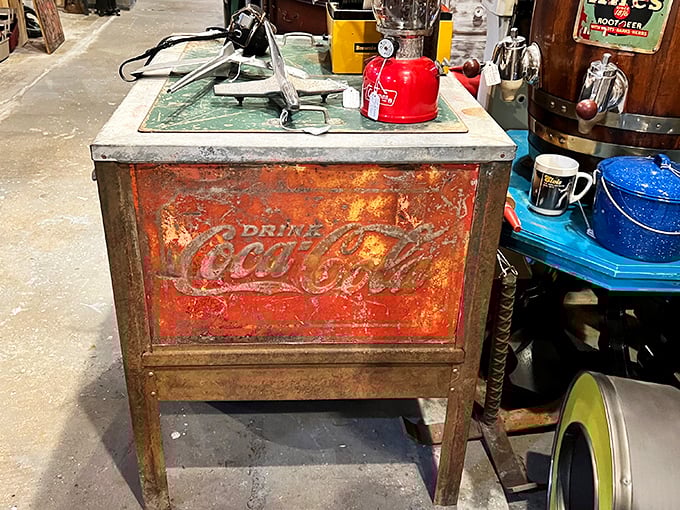 This weathered Coca-Cola cooler has quenched more thirsts than we'll ever know, its faded paint telling stories of countless summer days long past.